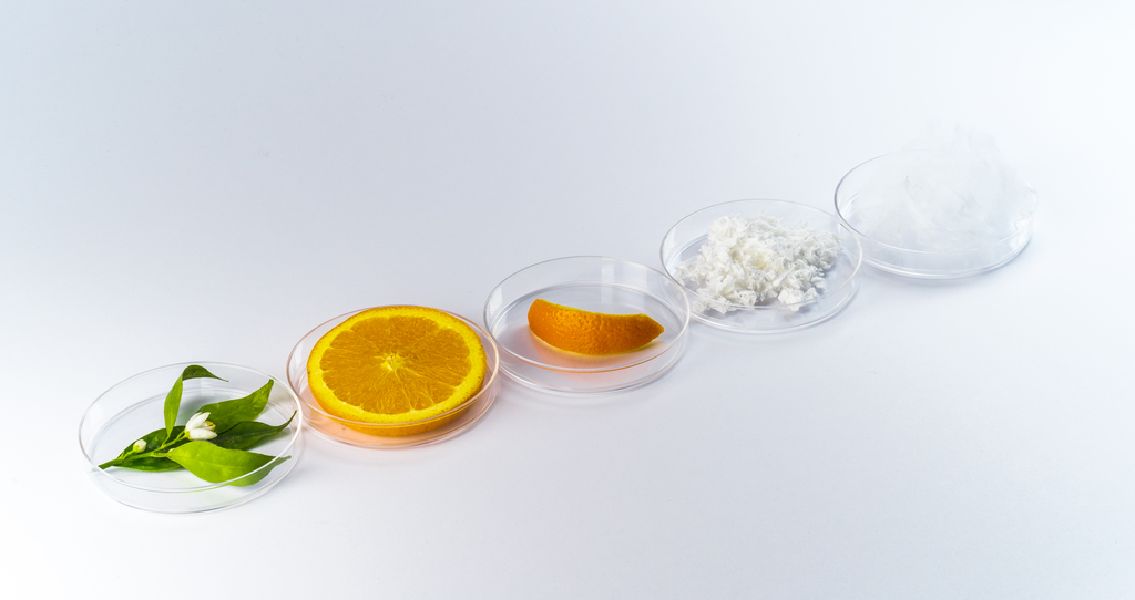 Lyocell fibre made with orange and wood pulp